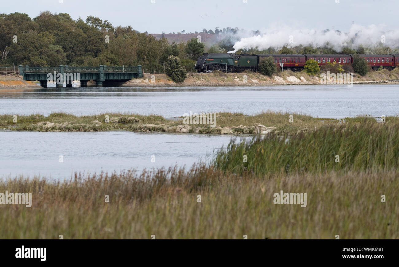 The Dorset Coast Express, pulled by LNER Class 4 steam locomotive Union ...