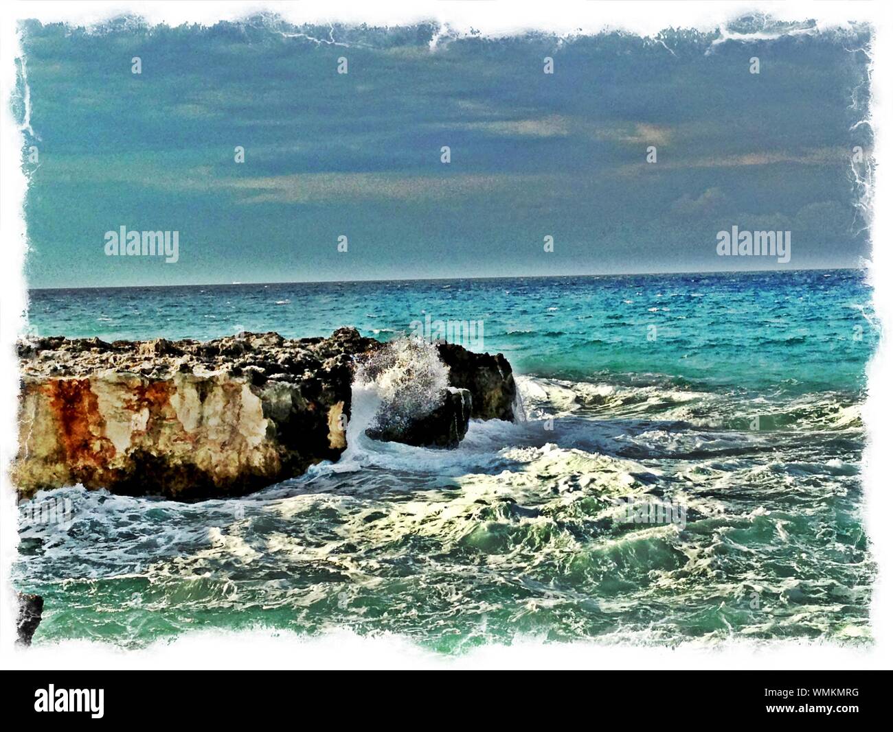 Waves breaking against cliff hi-res stock photography and images - Alamy