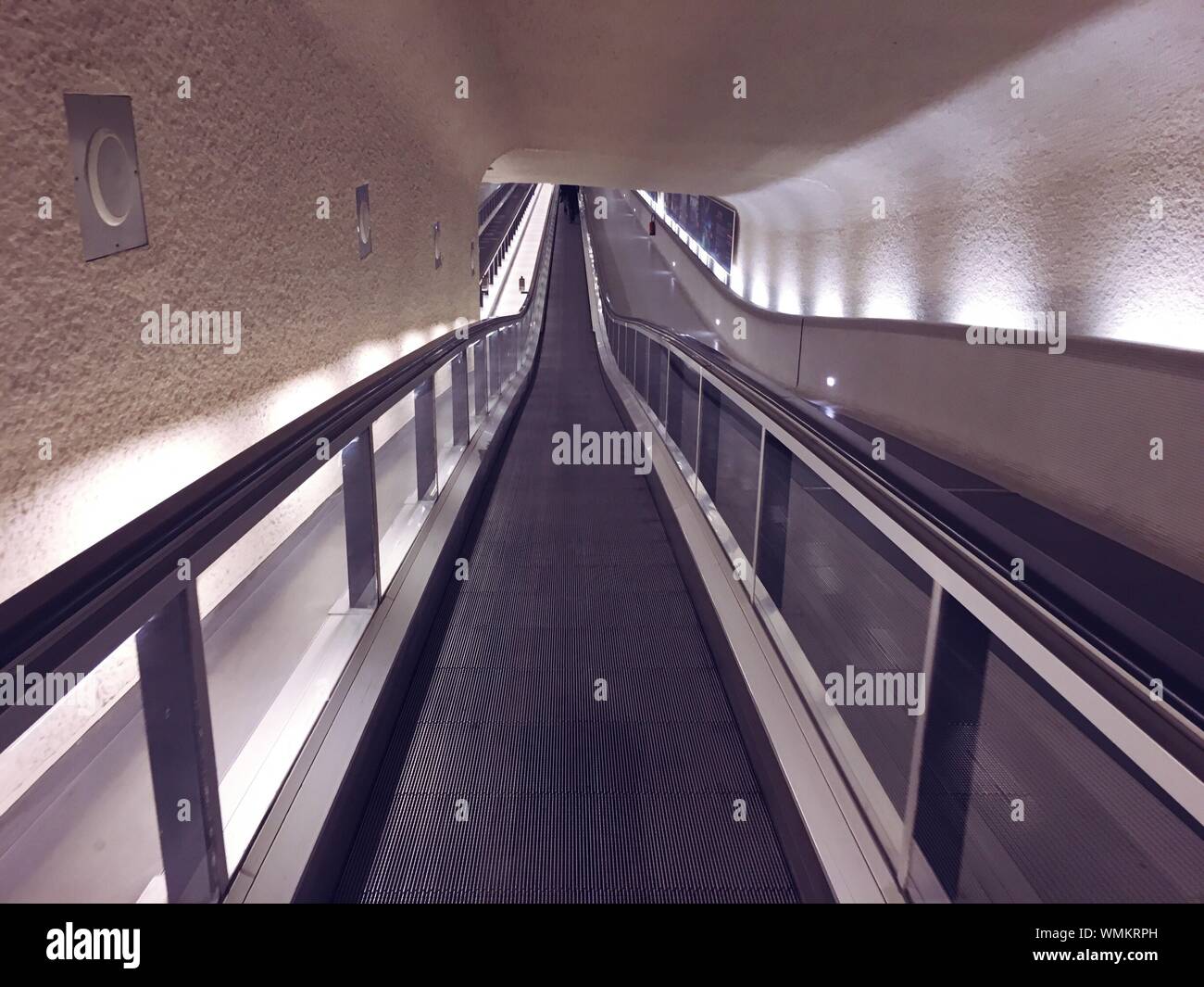 Airport and escalator hi-res stock photography and images - Alamy