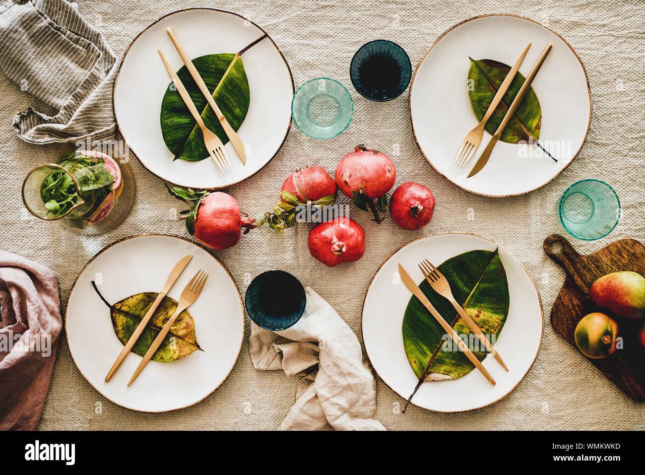 Fall or Autumn table styling for holiday dinner. Flat-lay of dinnerware ...