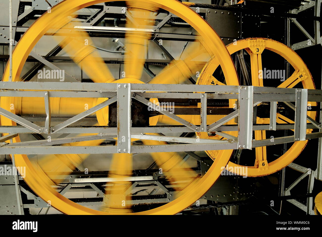 Yellow metal wheels hi-res stock photography and images - Alamy