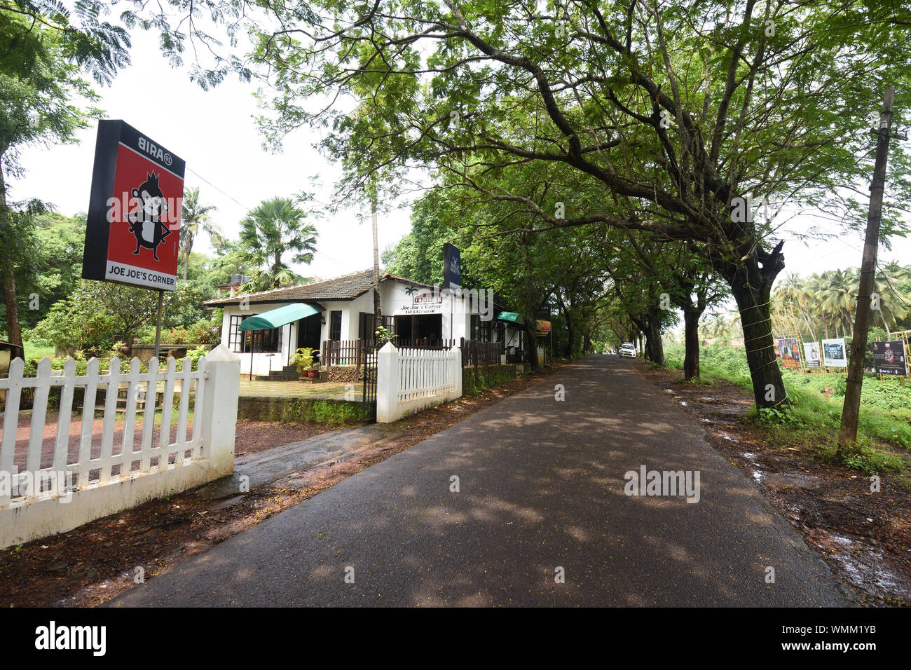 Lower Aguada Fort and Sinquerim Beach approach road. Bardez, North Goa ...