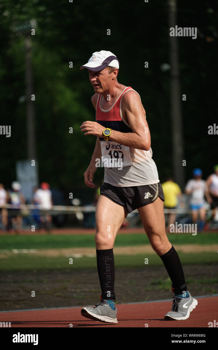 MOSCOW, RUSSIA - MAY 10, 2019: Russian athlete is running on tournament ...