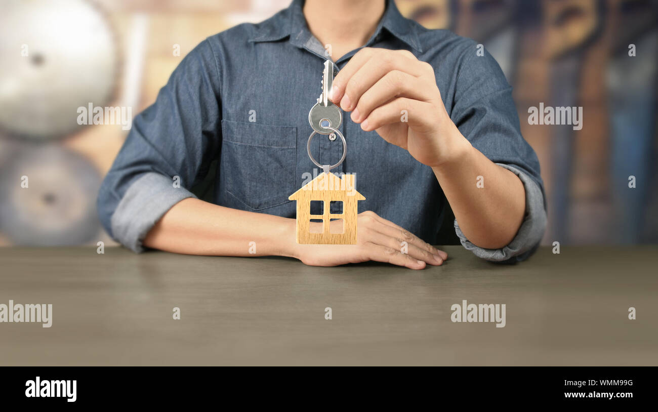 Handing over house keys hi-res stock photography and images - Alamy