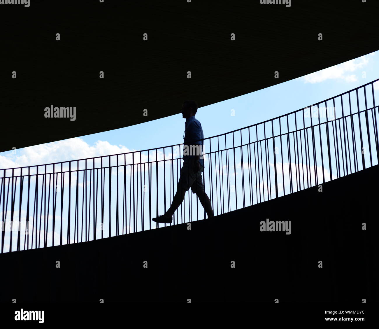 Man walking side view low angle hi-res stock photography and images - Alamy