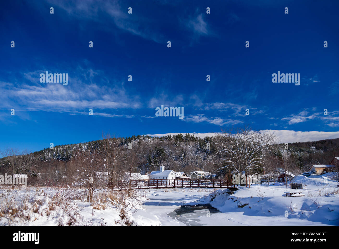 Stowe Rec Path Bridge with Stowe Village in the background in winter ...