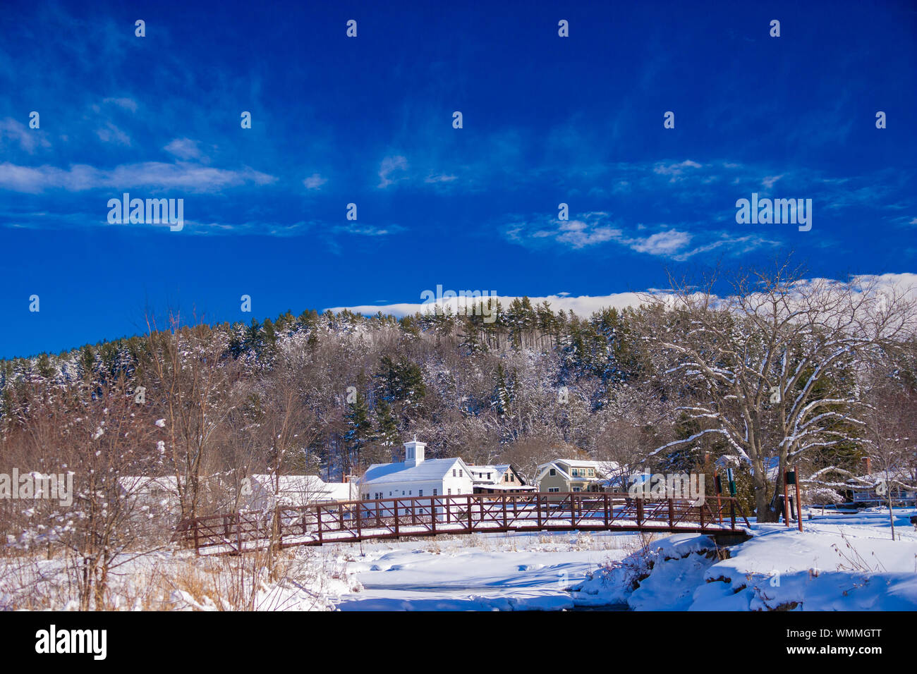 Stowe Rec Path Bridge with Stowe Village in the background in winter ...