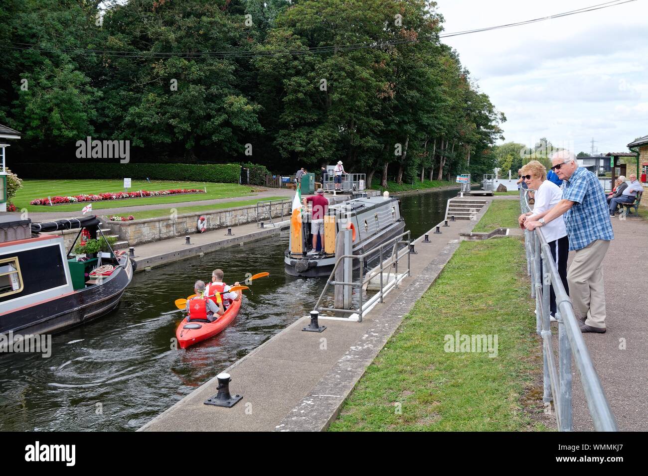 Various river crafts passing through Shepperton lock Surrey England UK ...