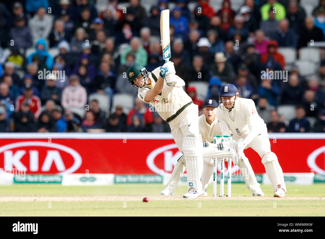 Australia's Tim Paine hits a run to get to a half century during day ...