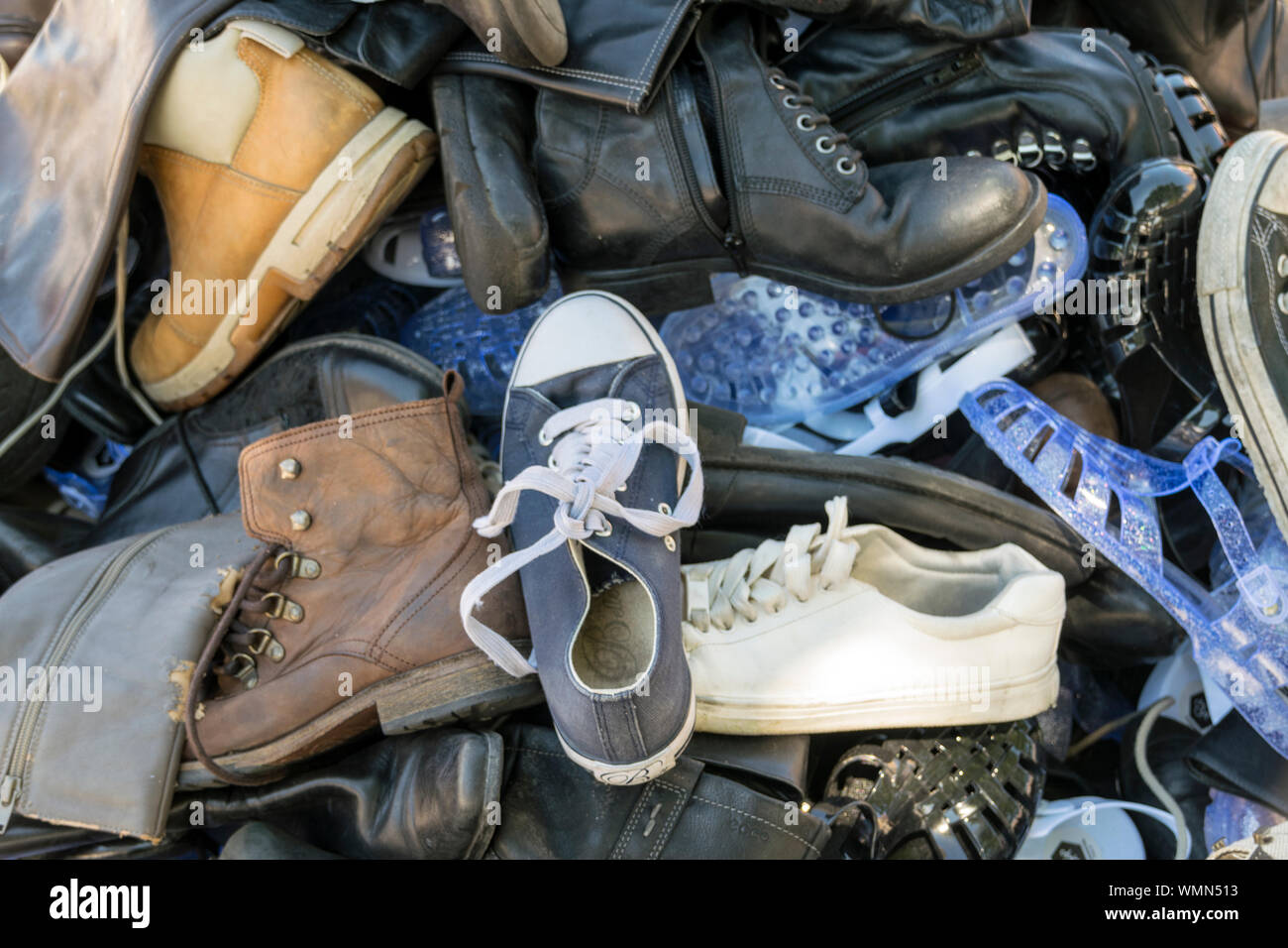 Heap of shoes hi-res stock photography and images - Alamy