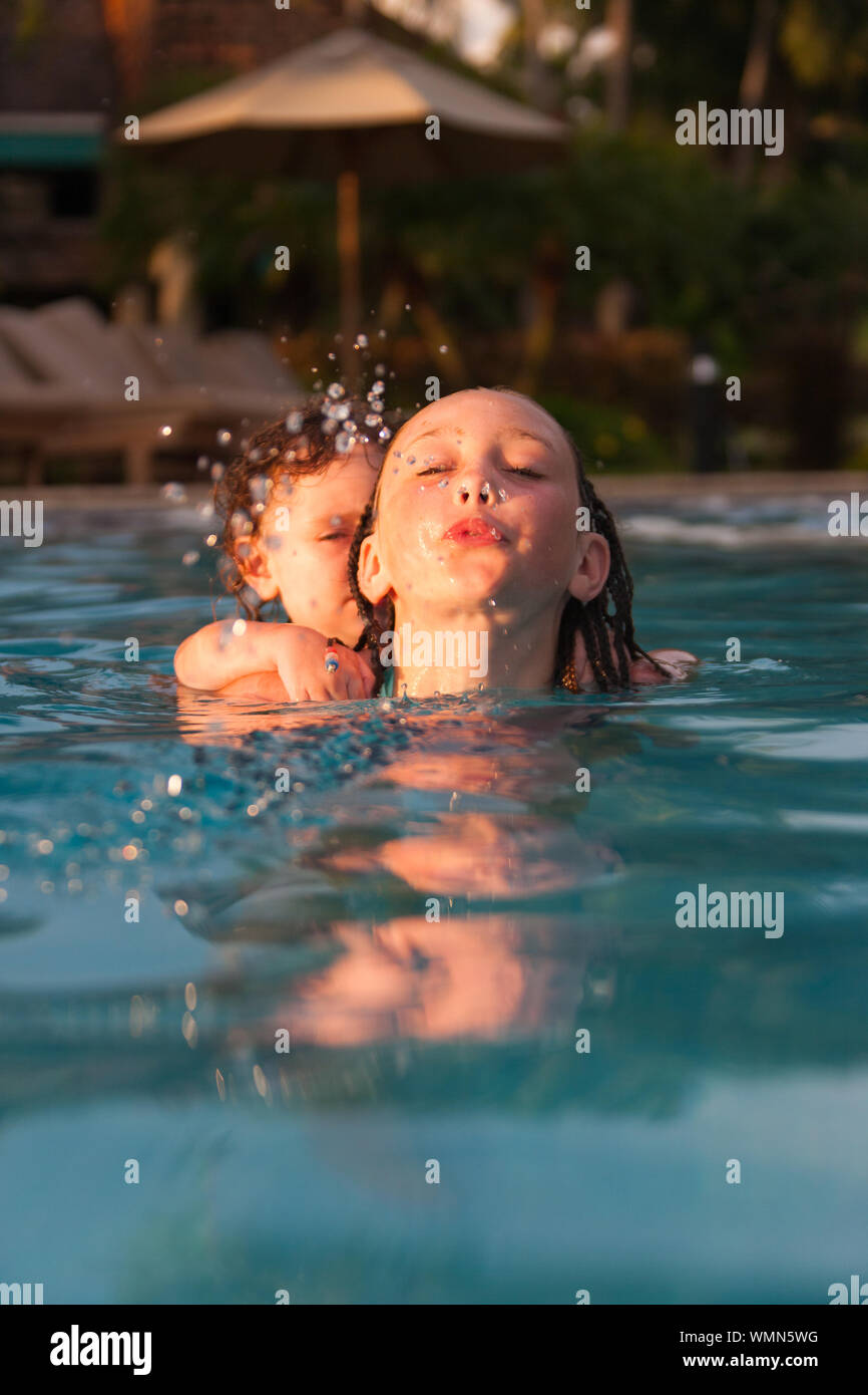 Girl getting piggyback ride hi-res stock photography and images - Alamy