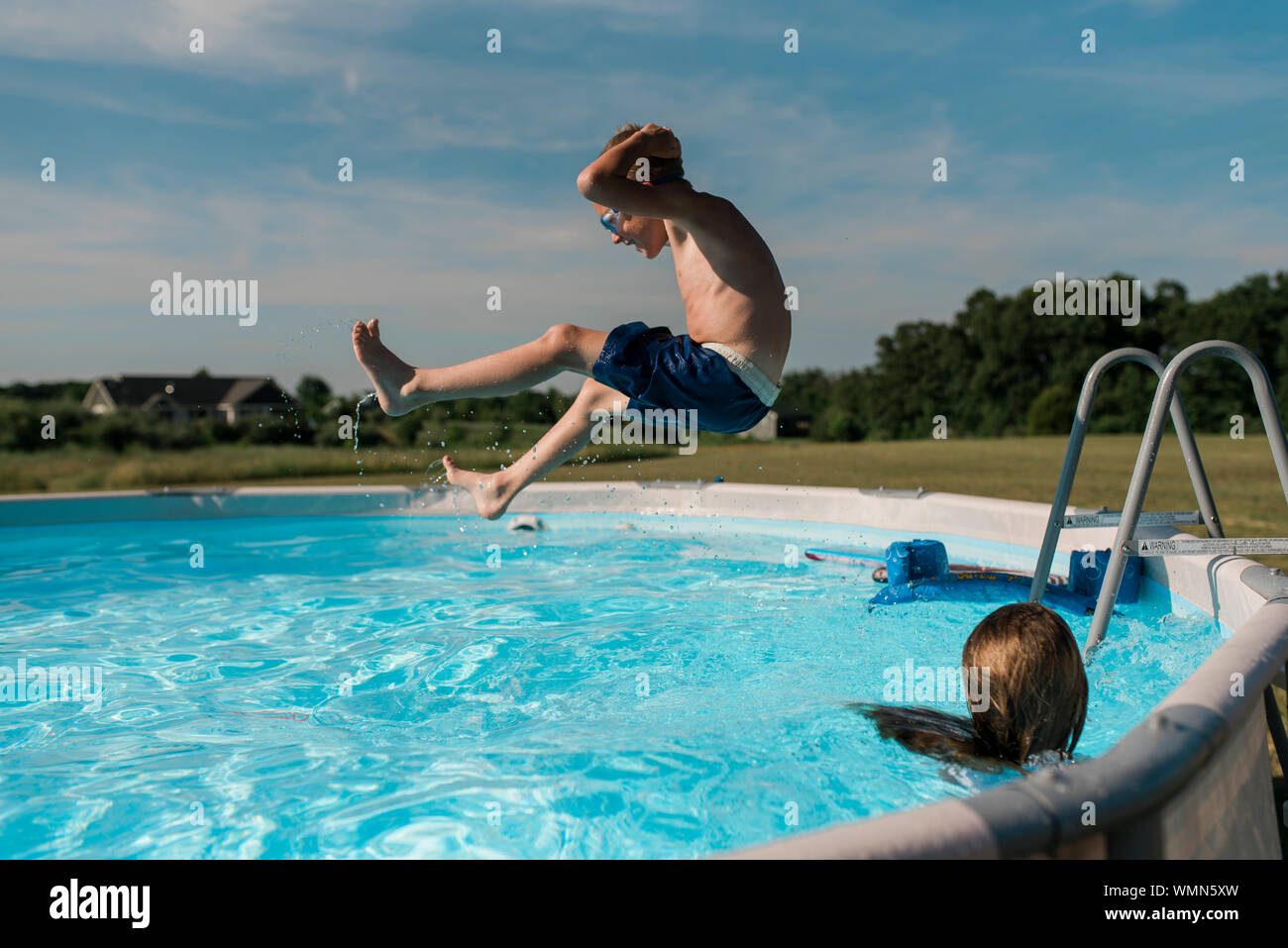 Backyard Pool Kids Stock Photos & Backyard Pool Kids Stock Images - Alamy