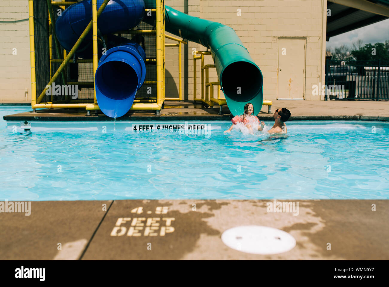 Man water slide hi-res stock photography and images - Alamy