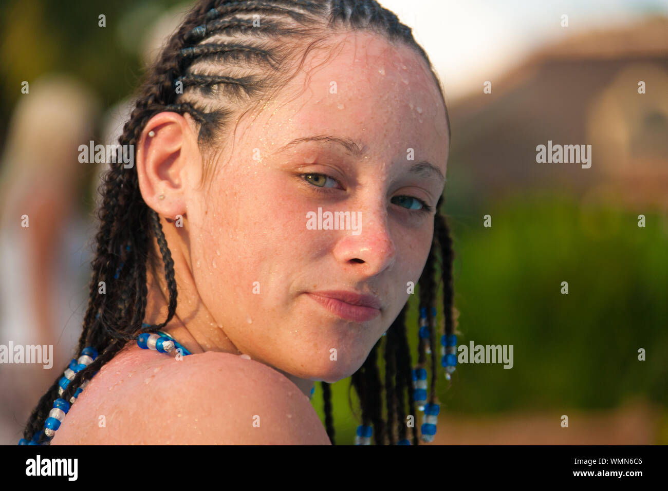 Young teenage girl with braided corn row hair in the Caribbean, St ...