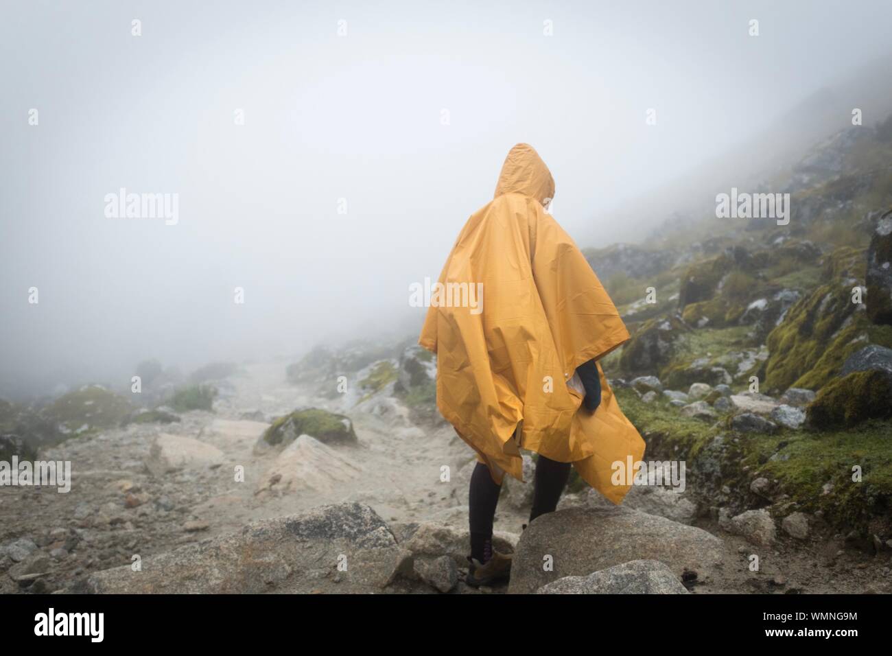 Man yellow raincoat hi-res stock photography and images - Alamy