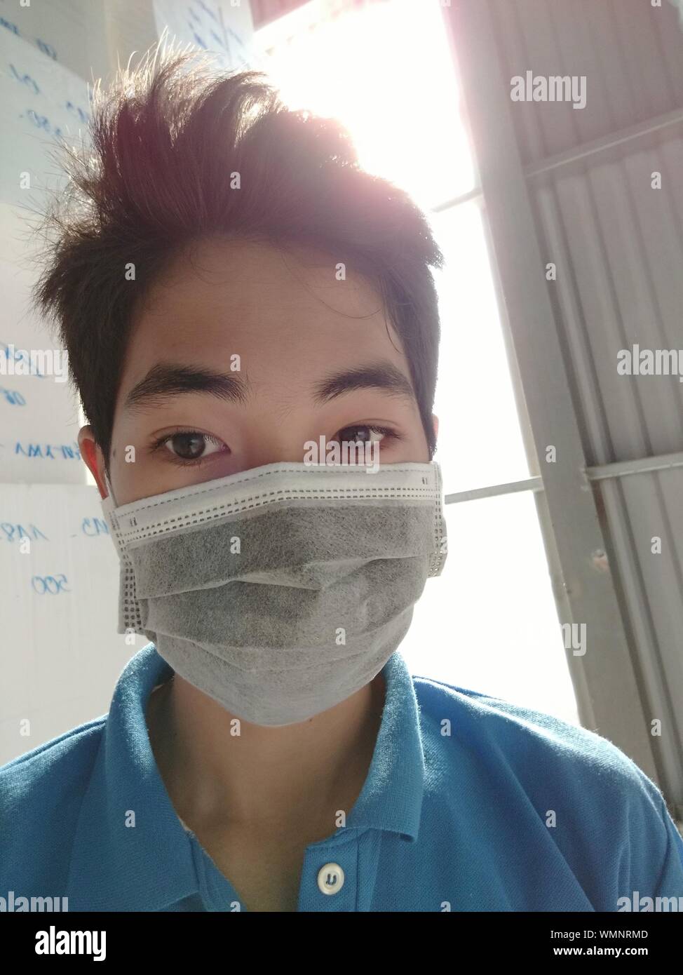 Indian man wearing face mask hi-res stock photography and images - Alamy