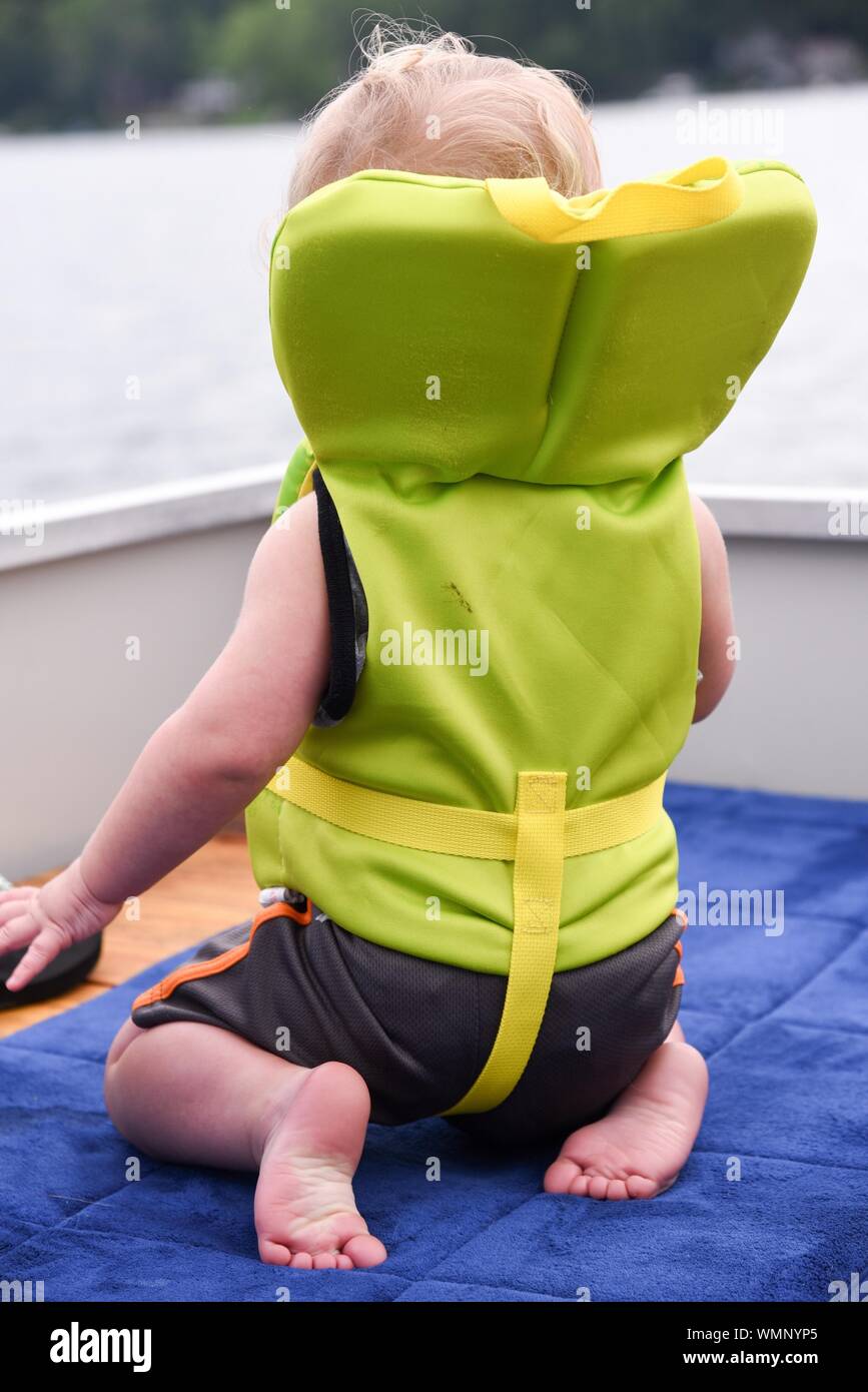 Boy rear view boat hi-res stock photography and images - Alamy