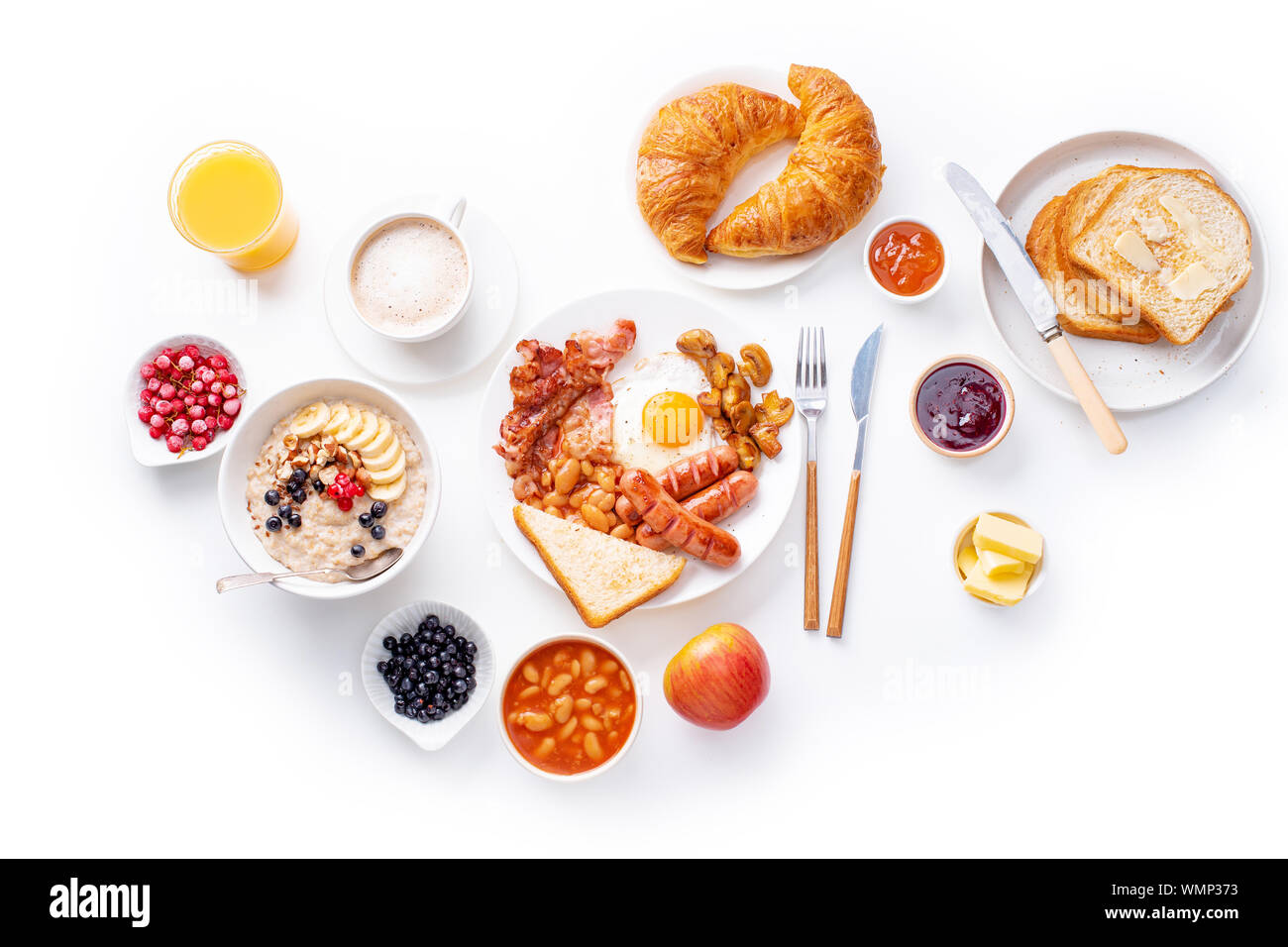 Top view flatlay with varieties of fresh breakfast: fried eggs with ...
