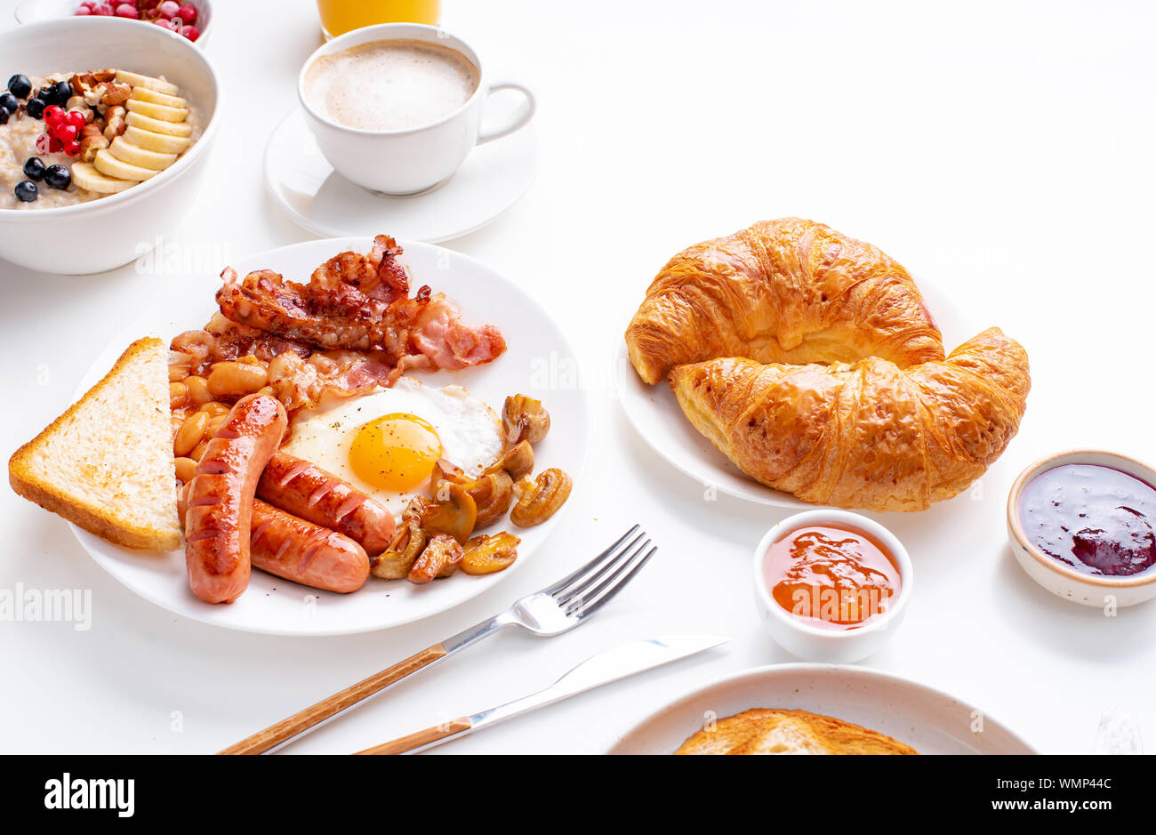 Top view flatlay with varieties of fresh breakfast: fried eggs with ...