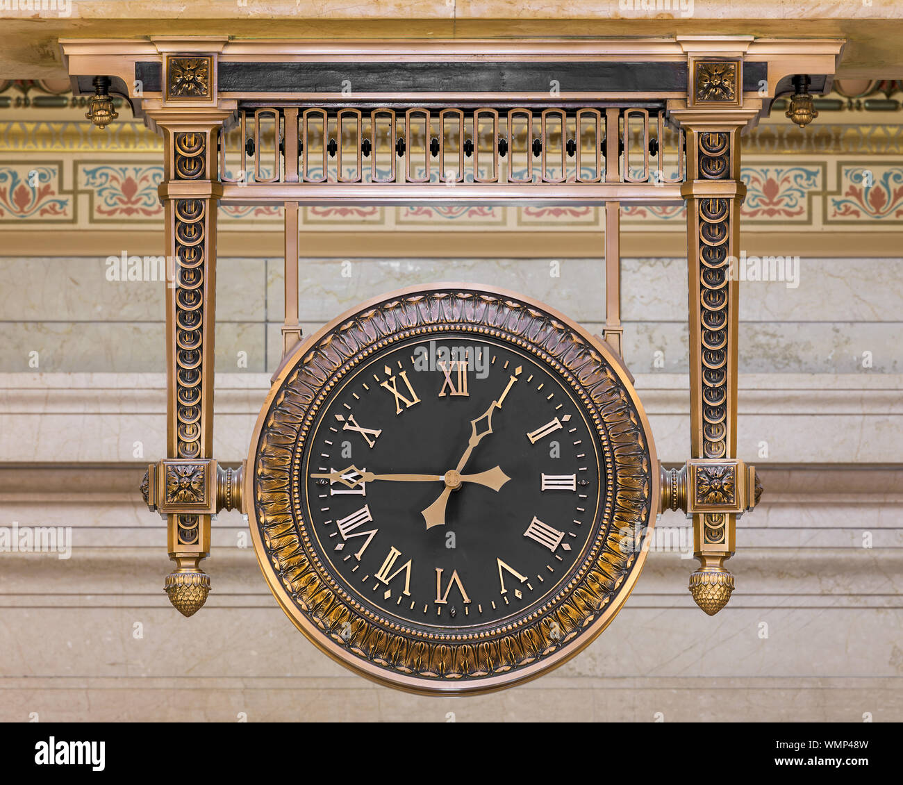 Old clock hanging in the lobby of the historic City Hall on Lakeside ...