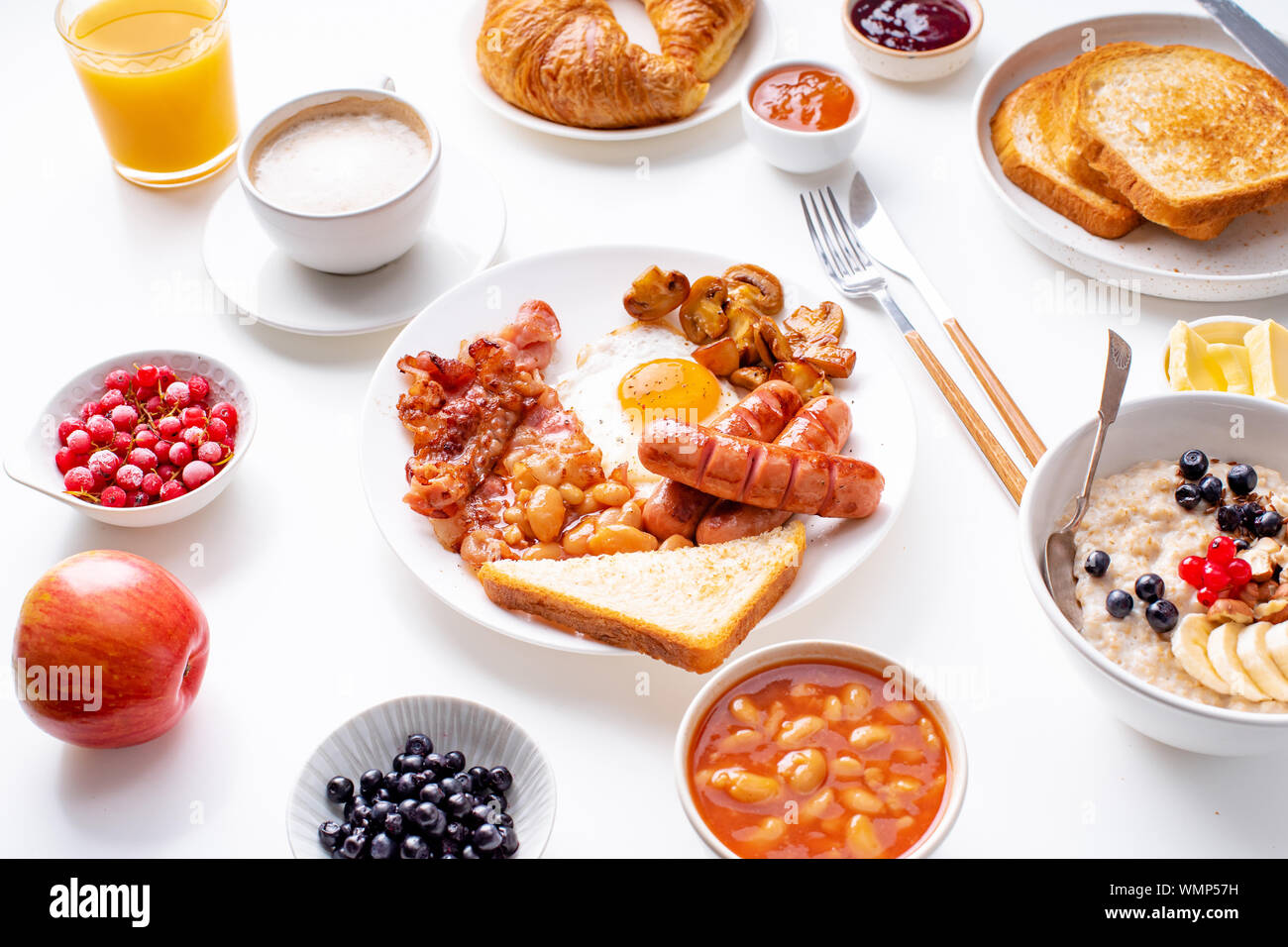 Top view flatlay with varieties of fresh breakfast: fried eggs with ...