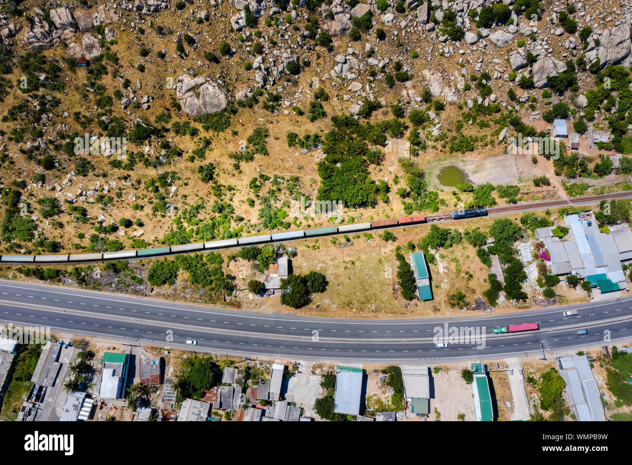 Aerial view of train and railway at Ca Na area town, Ninh Thuan ...