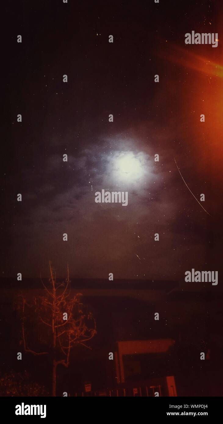 Full moon behind clouds night hi-res stock photography and images - Alamy