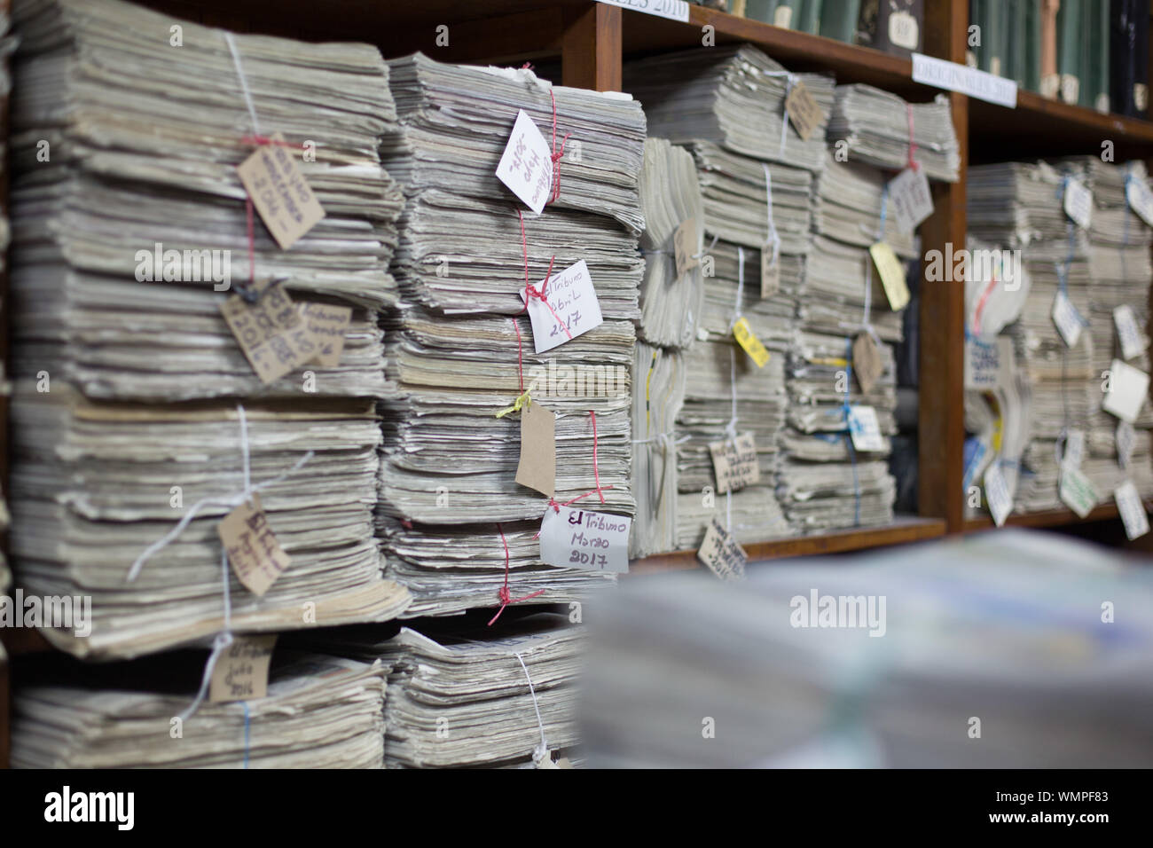 newspaper library have a lot of olds newspapers Stock Photo - Alamy