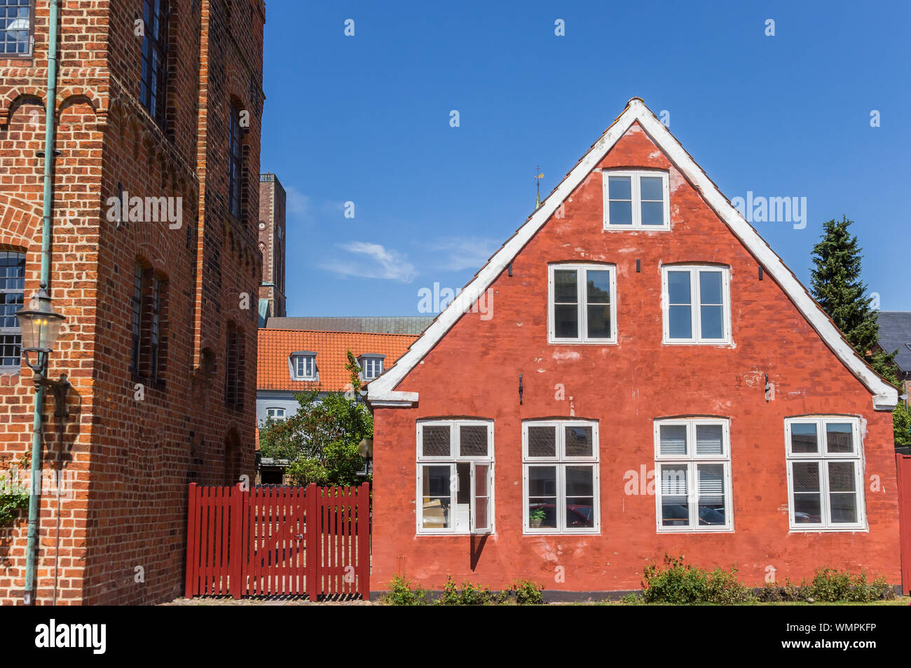 Little red house next to the town hall of Ribe, Denmark Stock Photo - Alamy