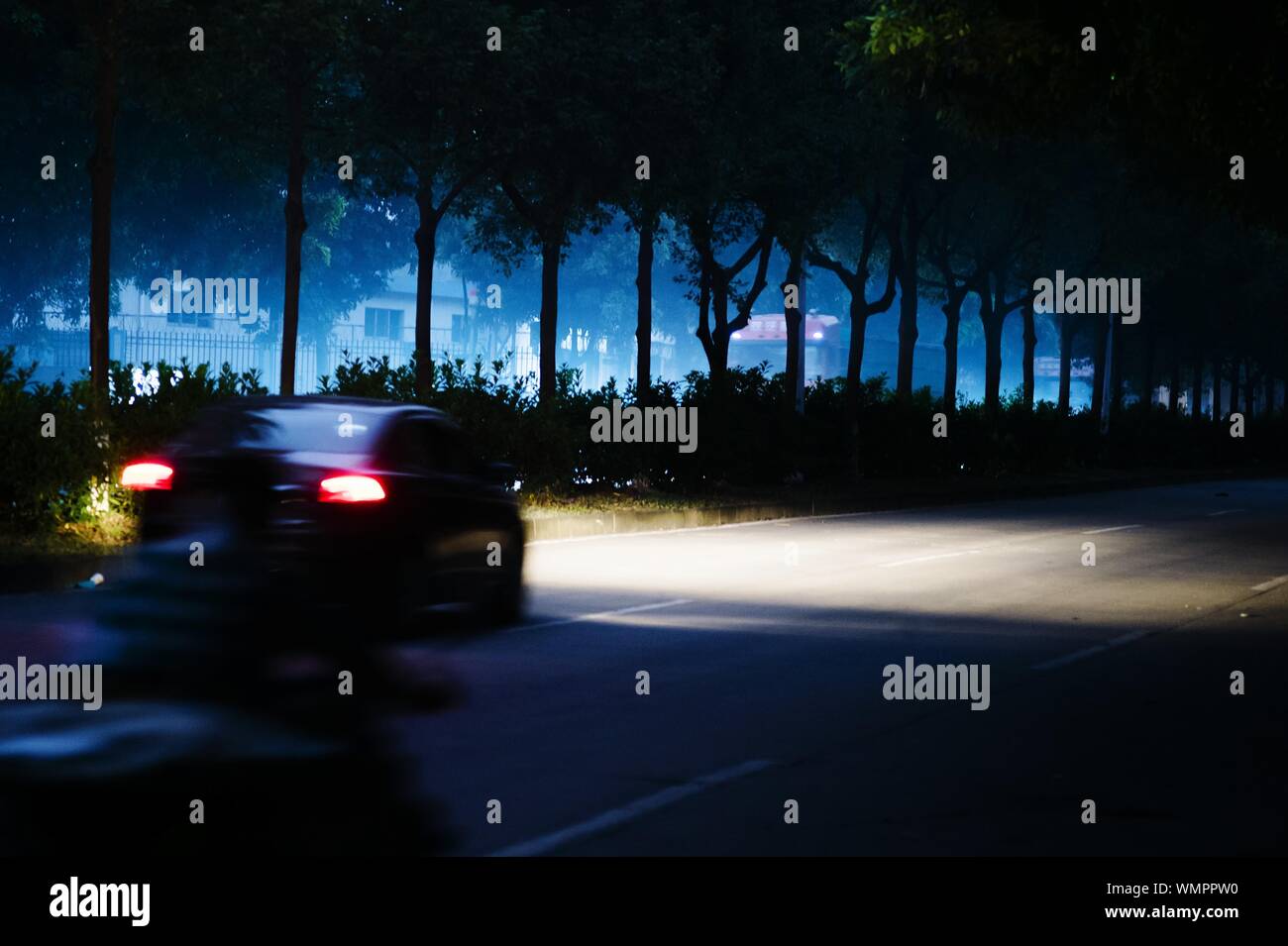 Cars On Road At Night Stock Photo - Alamy