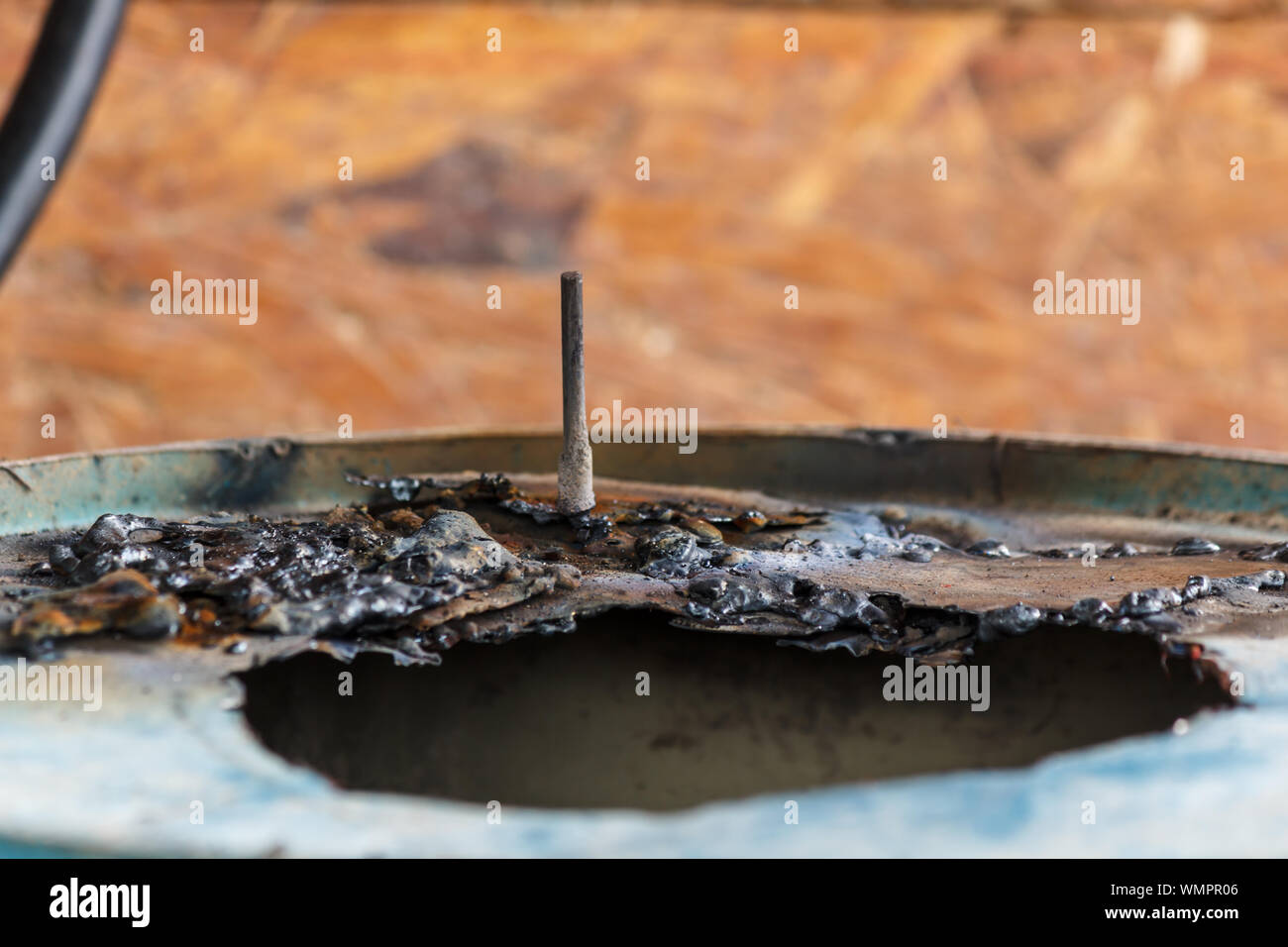 Finishing bad welding Process with blue tube metal Stock Photo - Alamy