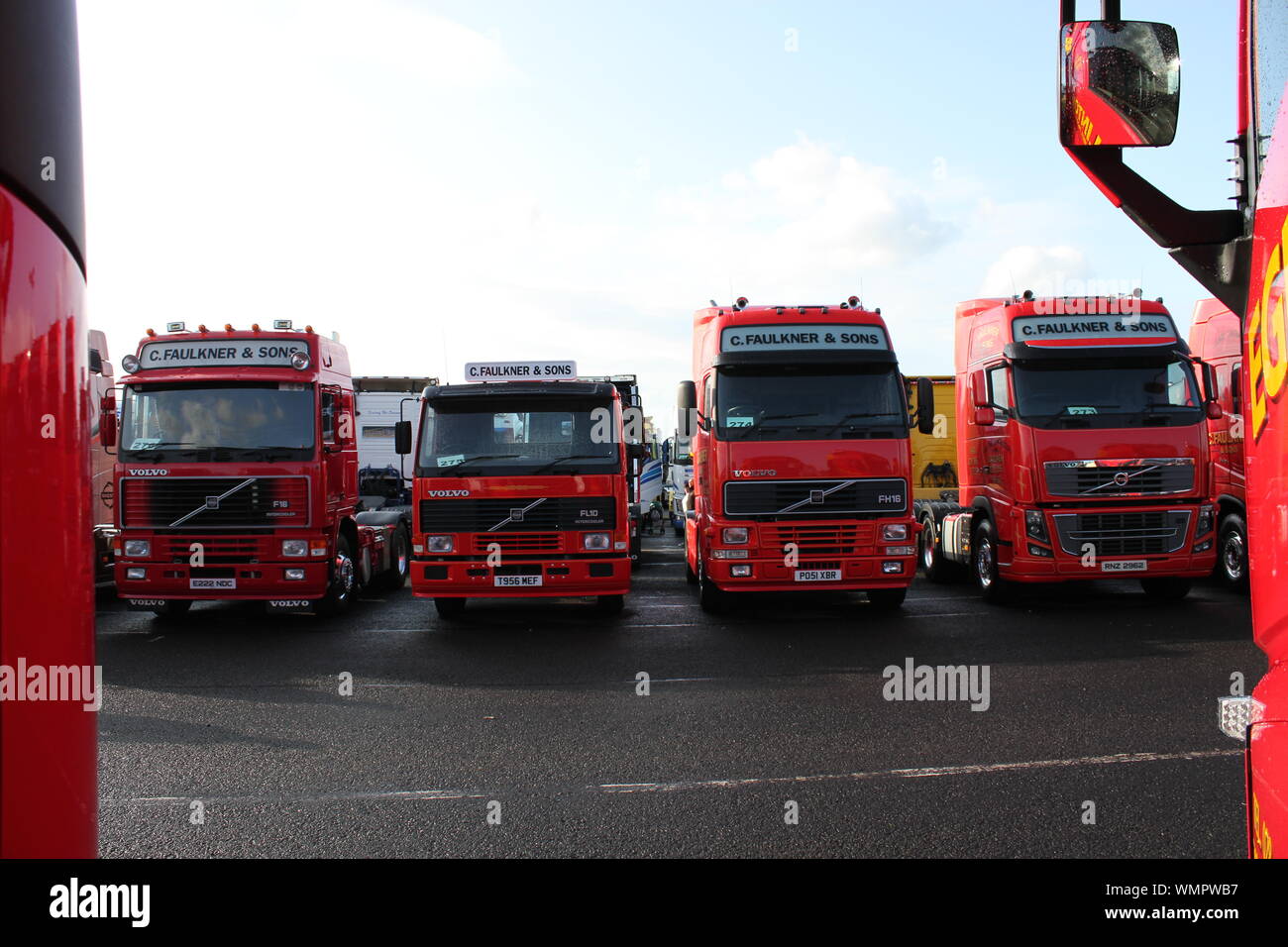 A row of red Volvo lorries (F16,FL10,FH16,FL16)owned by C. Faulkner and ...