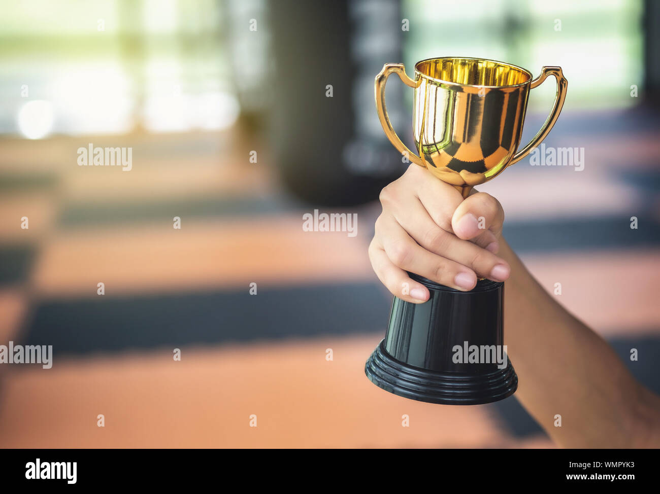 Man holding trophy hi-res stock photography and images - Alamy