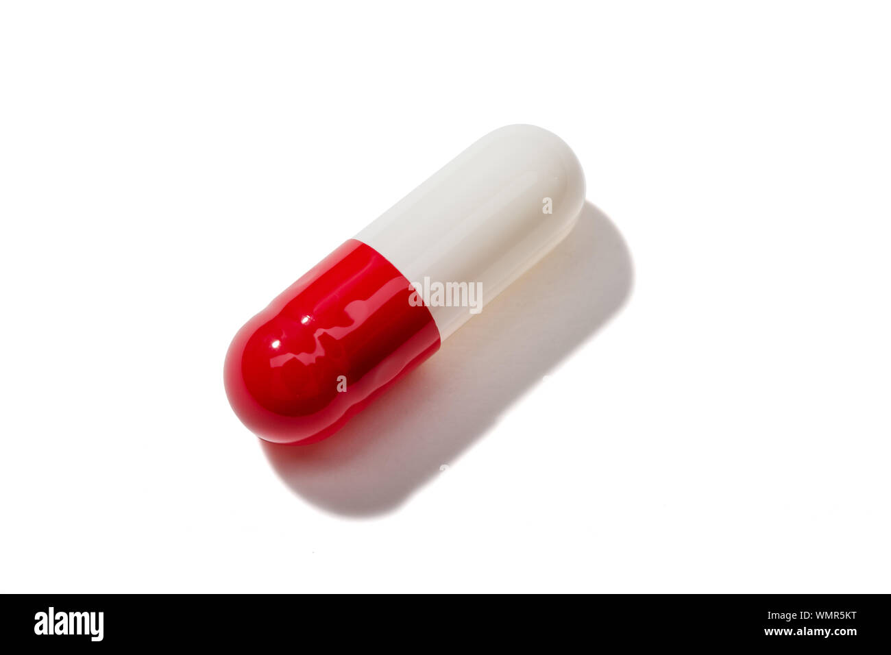 Pill capsule isolated on white background. Medicine, healthcare and ...