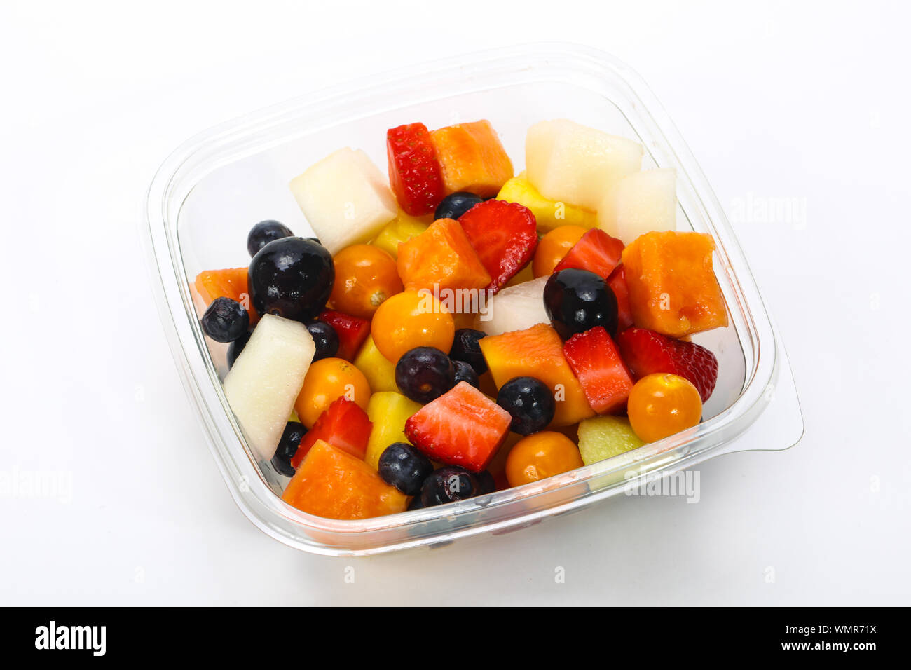 Sliced tropical fruit mix snack in the box Stock Photo - Alamy