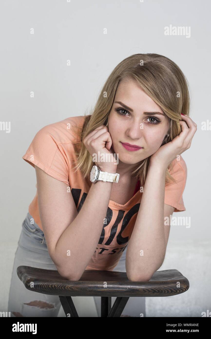 Leaning on stool hi-res stock photography and images - Alamy