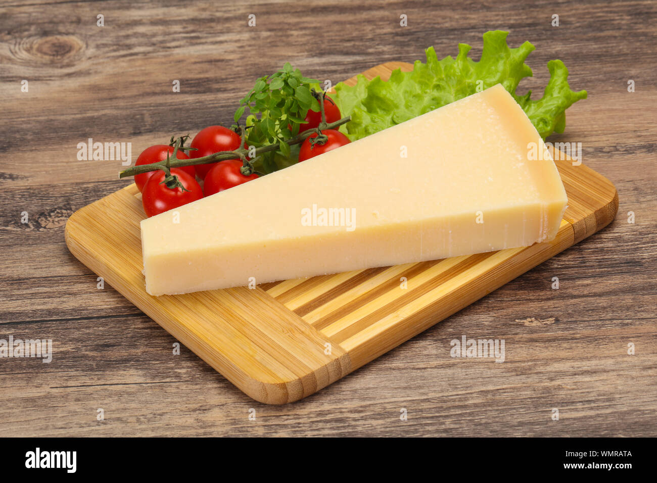 Italian traditional parmesan cheese triangle served salad Stock Photo ...