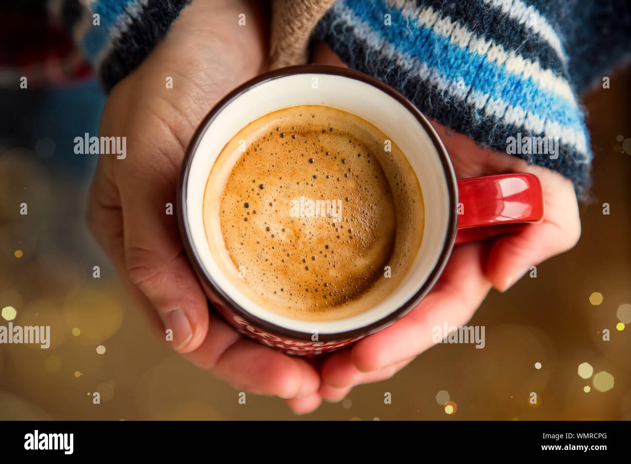 Cozy fall coffee cup top view, woman hands holding warm rustic autumn ...