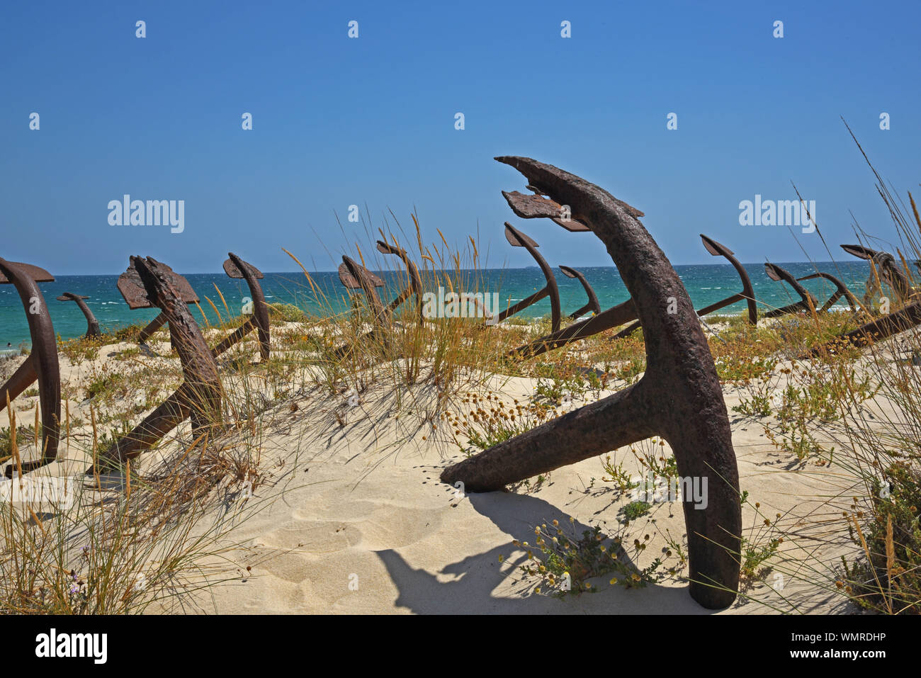 Rusty anchor on the beach hi-res stock photography and images - Alamy