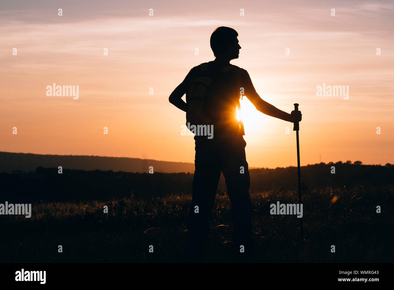 Silhouette of a champion on the high mountain. Sport and active life ...