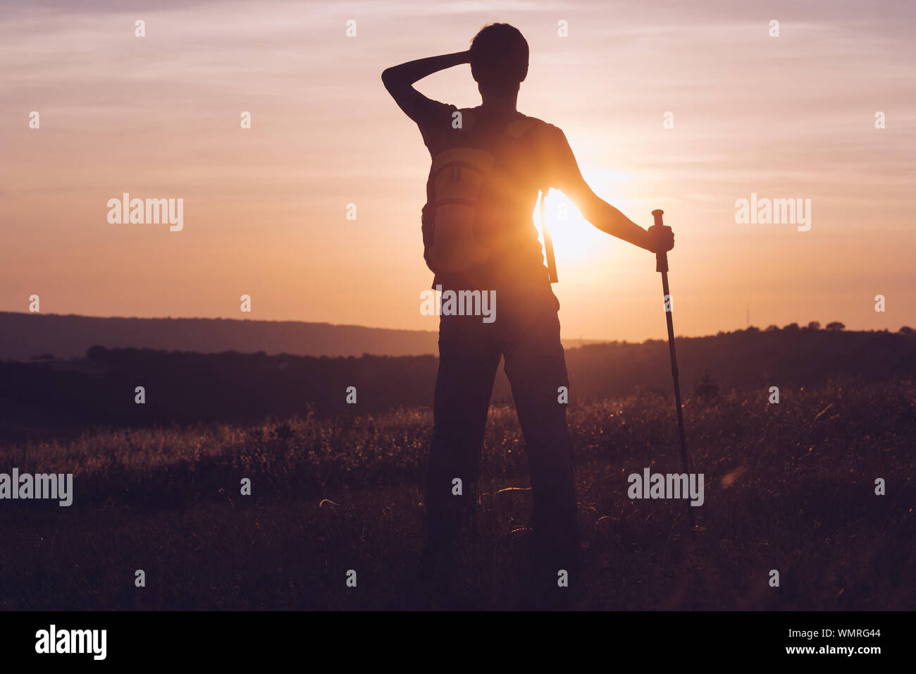 Silhouette of a champion on the high mountain. Sport and active life ...