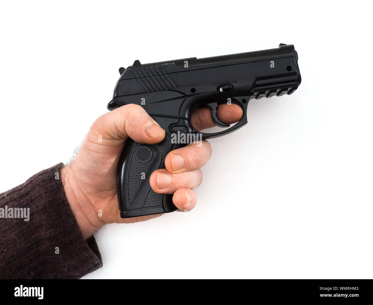 Hand holding toy gun hi-res stock photography and images - Alamy