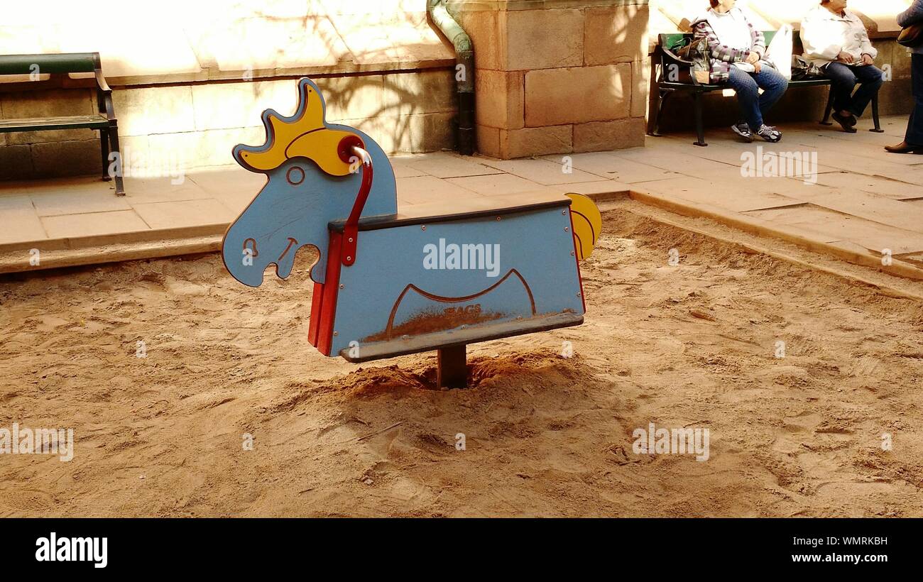 Man and toy horse hi-res stock photography and images - Alamy