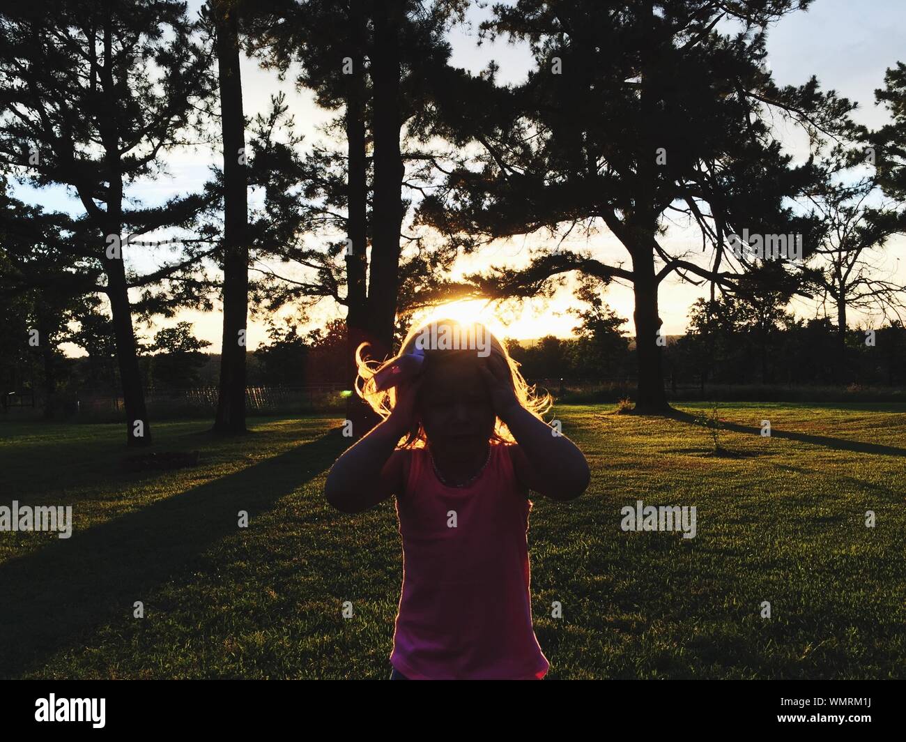 Girl Crying At Park Stock Photo - Alamy