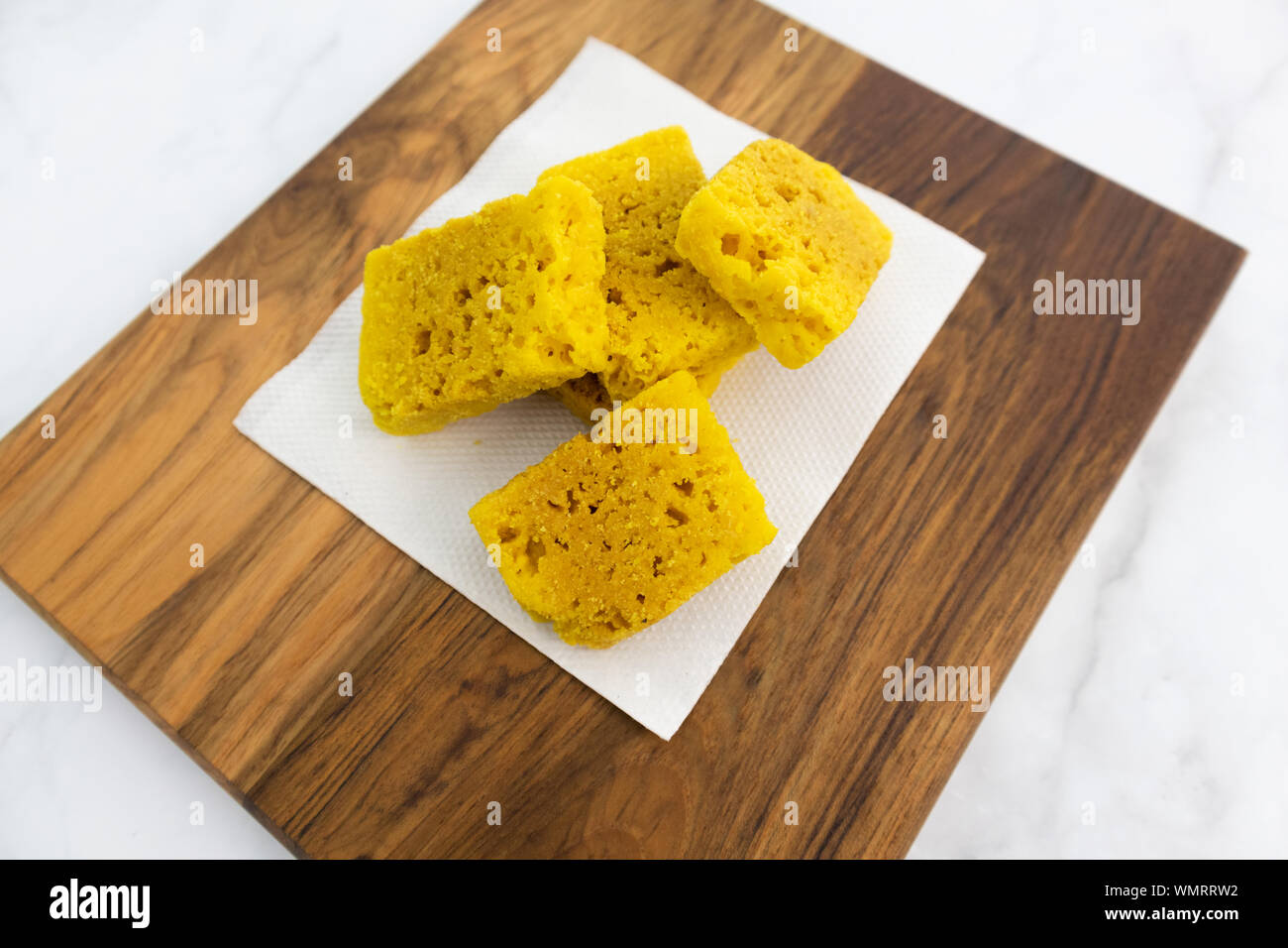 Mysore pak or Mysuru paaka, is an Indian sweet prepared with ghee ...