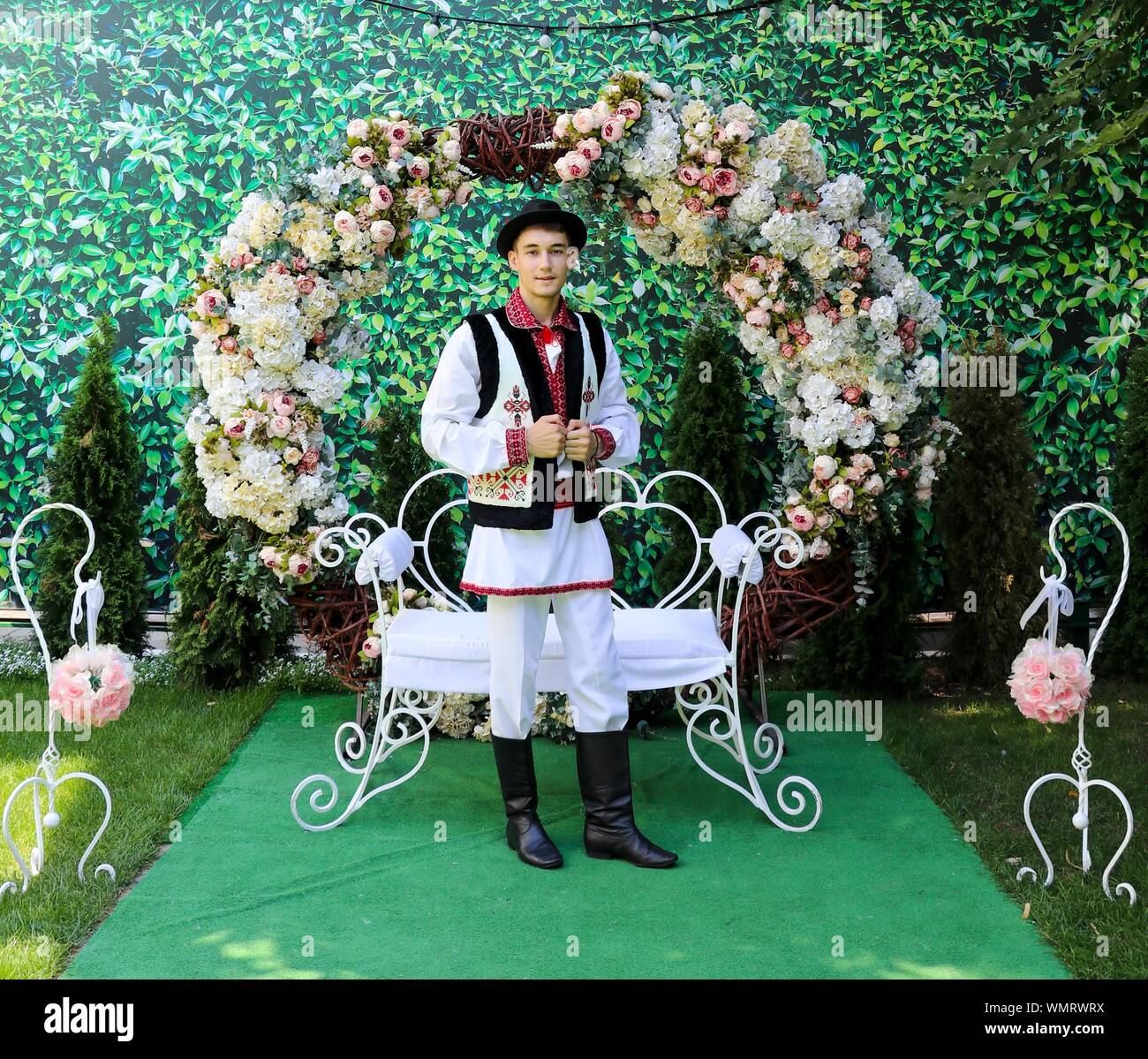 Young happy attractive male wearing traditional Moldavian clothes ...