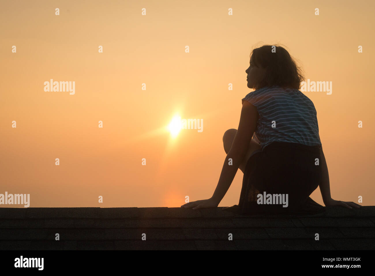 Rear view crouching woman High Resolution Stock Photography and Images ...