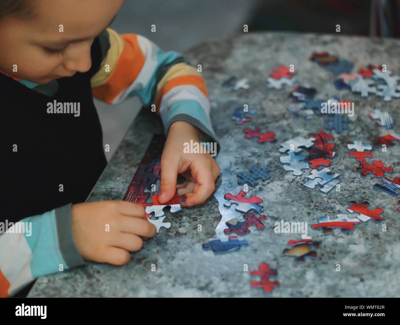 Boy puzzle hi-res stock photography and images - Alamy