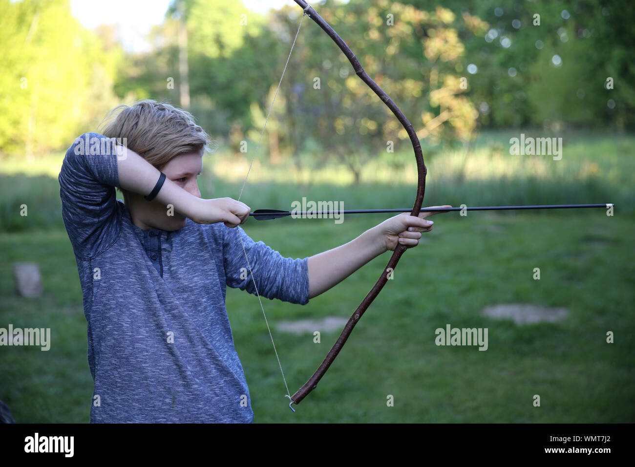 Boy arrow hi-res stock photography and images - Alamy