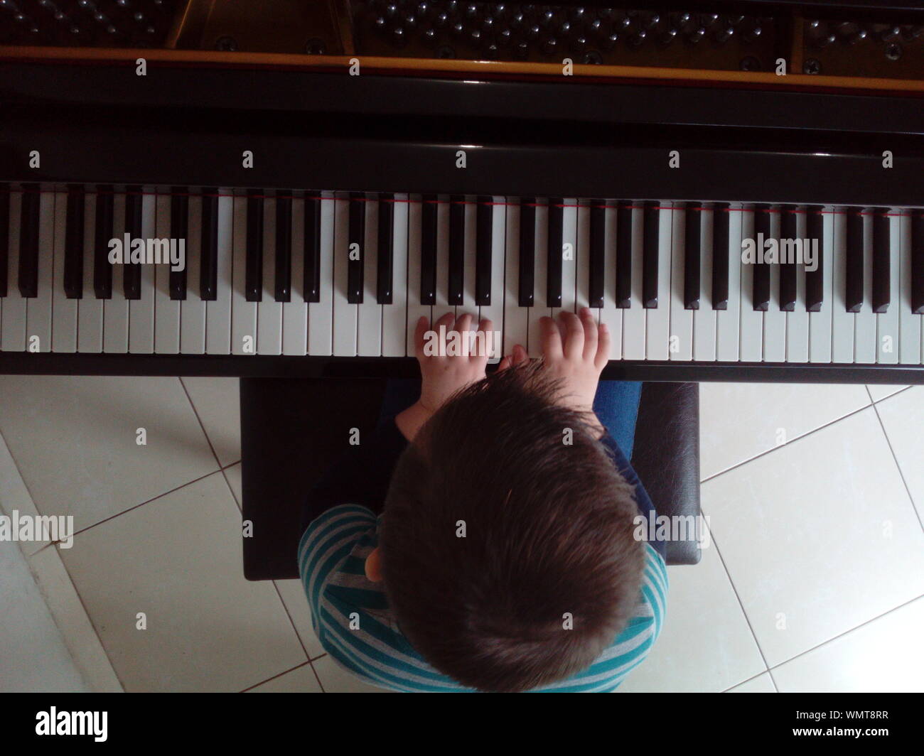 Boy Playing Piano High Resolution Stock Photography and Images - Alamy